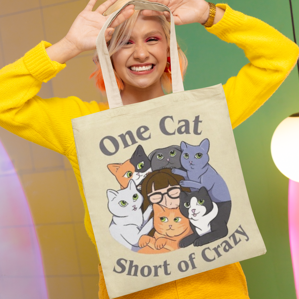 One Cat Short of Crazy Cream Tote Bag